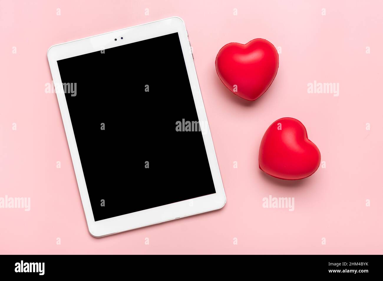 Tablet with pink heart hi-res stock photography and images - Alamy