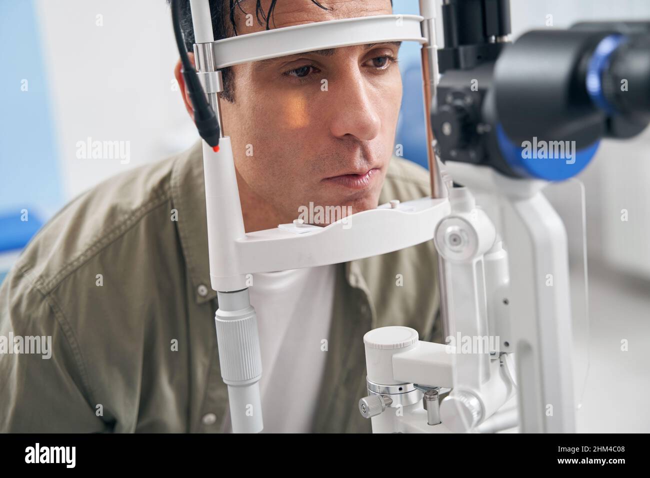 Patient having eye examination by doctor in hospital Stock Photo - Alamy