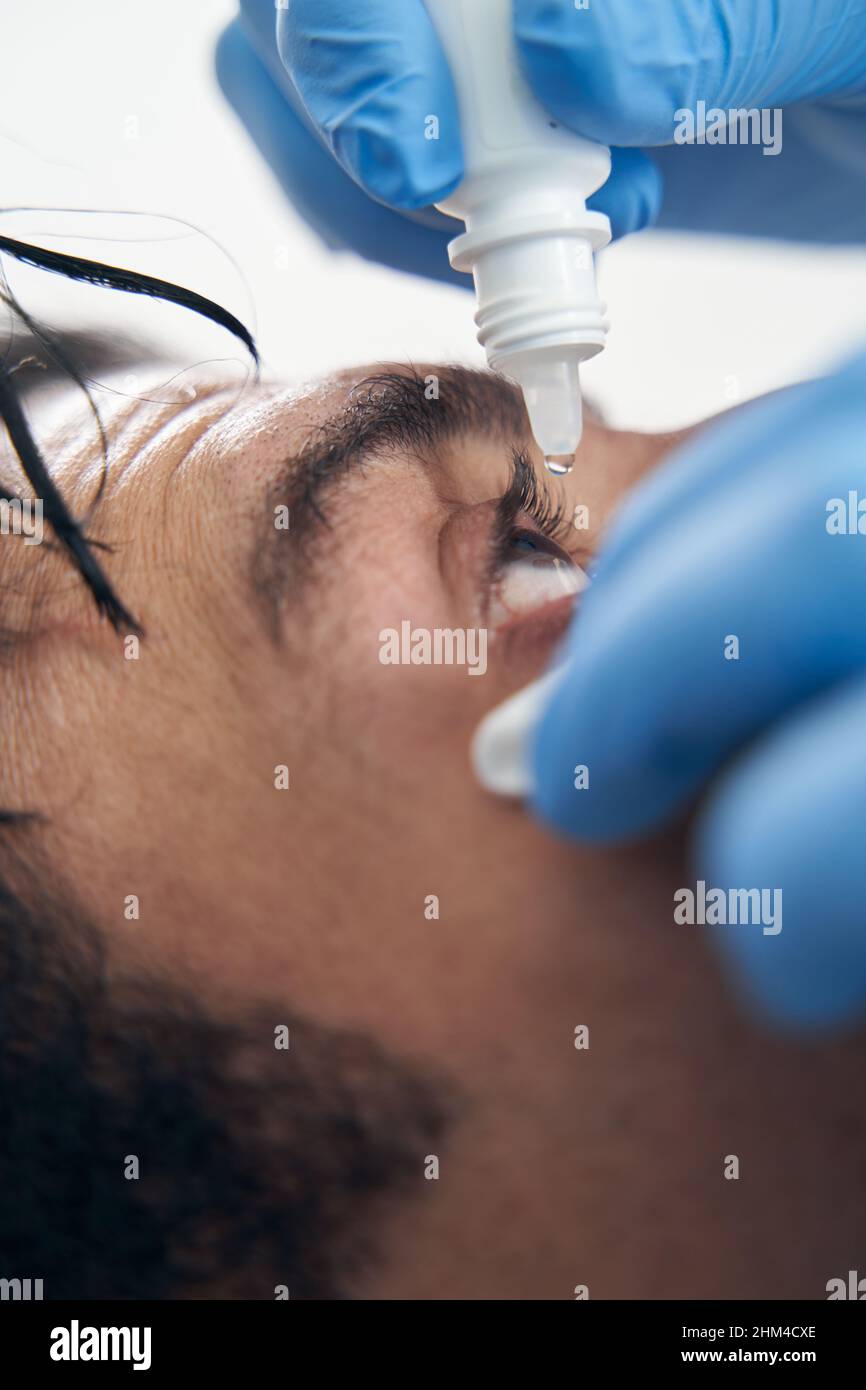 Doctor conducts eye treatment with medicine at the hospital Stock Photo ...