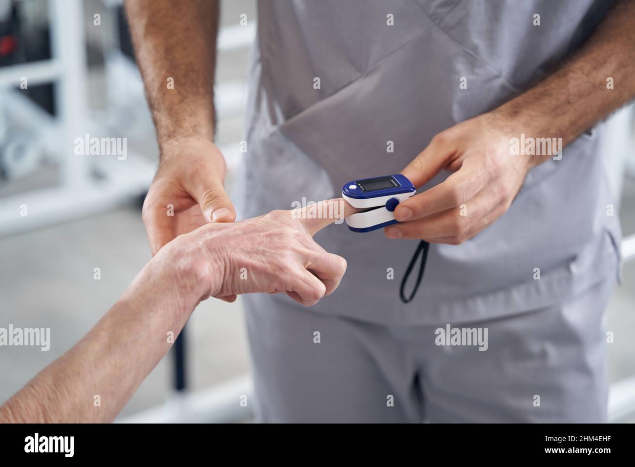 Man using pulse oximeter hi-res stock photography and images - Alamy