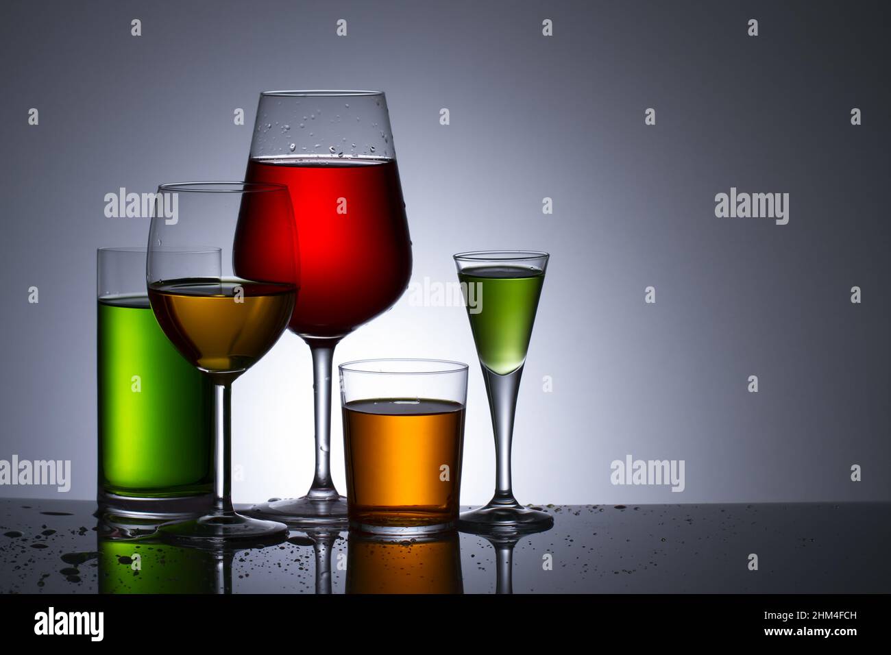 Colors of alcohol in glass Stock Photo - Alamy