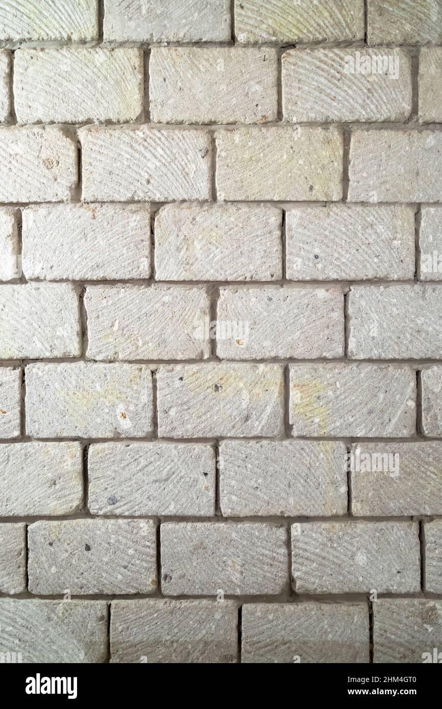 wall built of stone blocks of tuff Stock Photo - Alamy