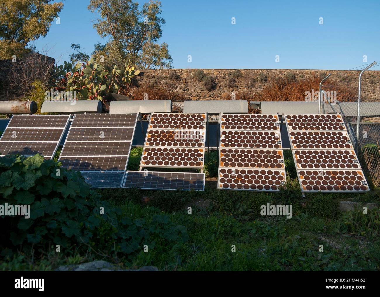 old and old disused solar panels in green area solar energy Stock Photo ...