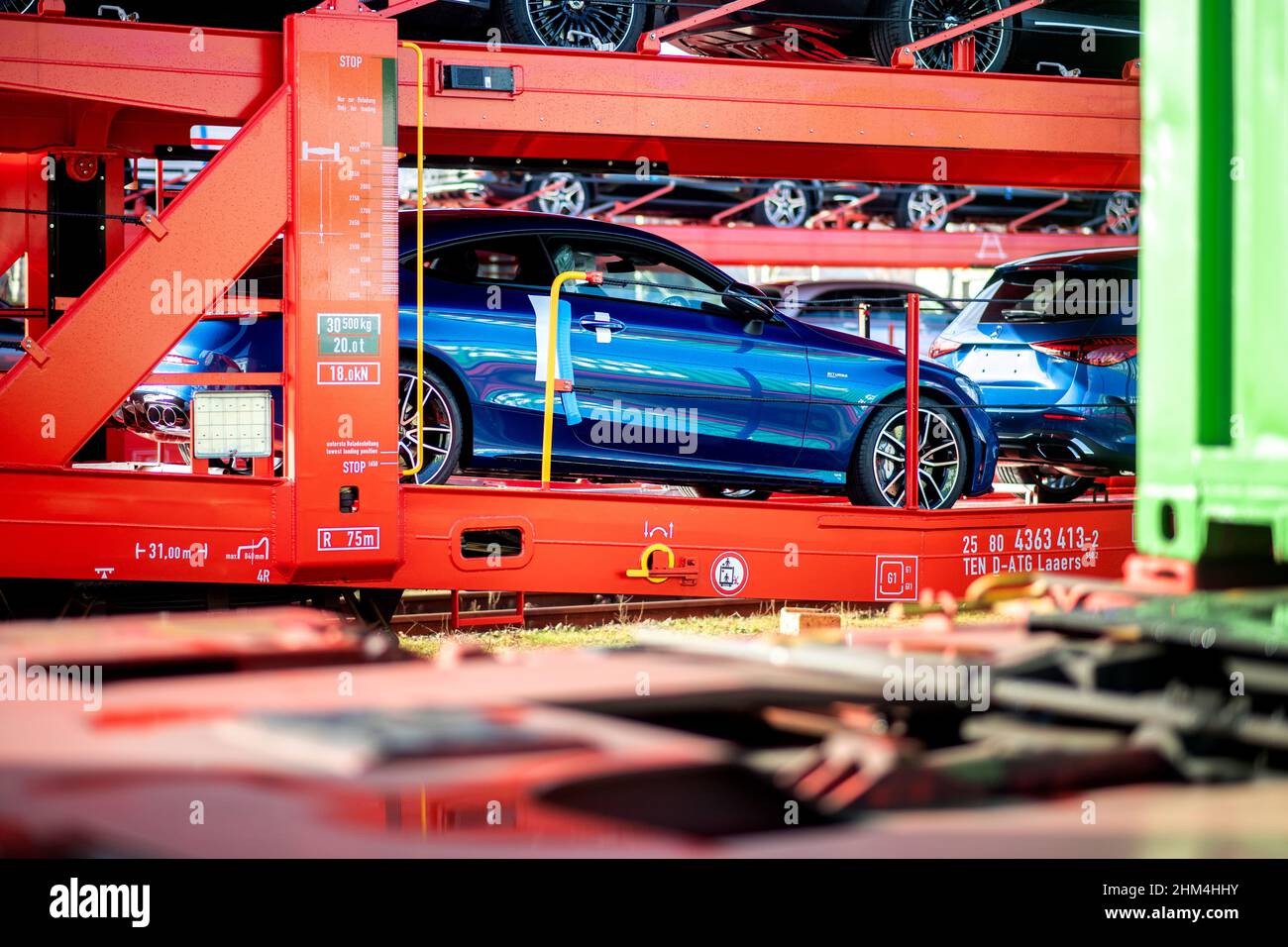 Bremen, Germany. 07th Feb, 2022. New Mercedes-Benz cars stand on a rail ...