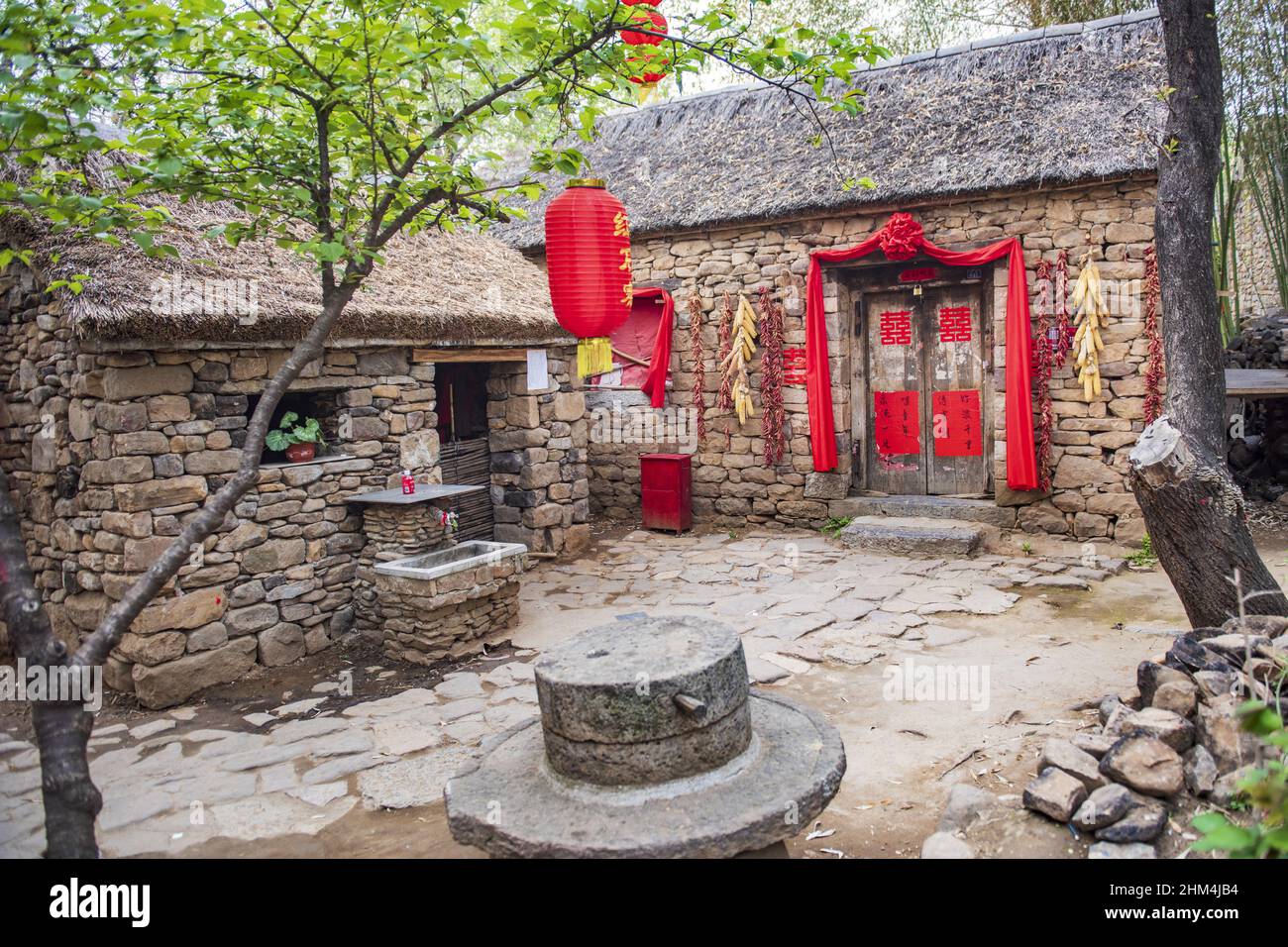 Stone mill of bamboo spring village Stock Photo - Alamy