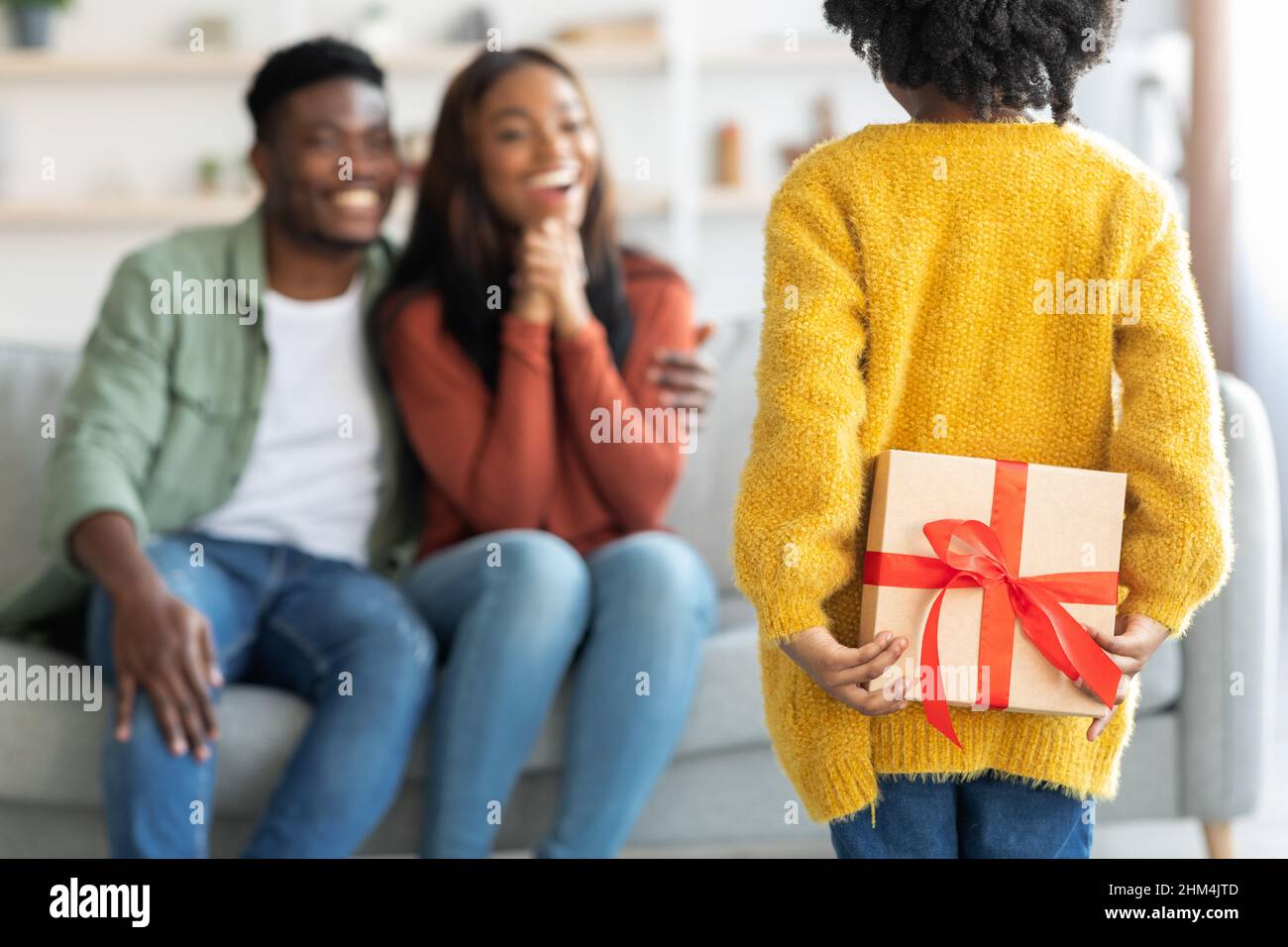 Woman surprise gift back hi-res stock photography and images - Alamy