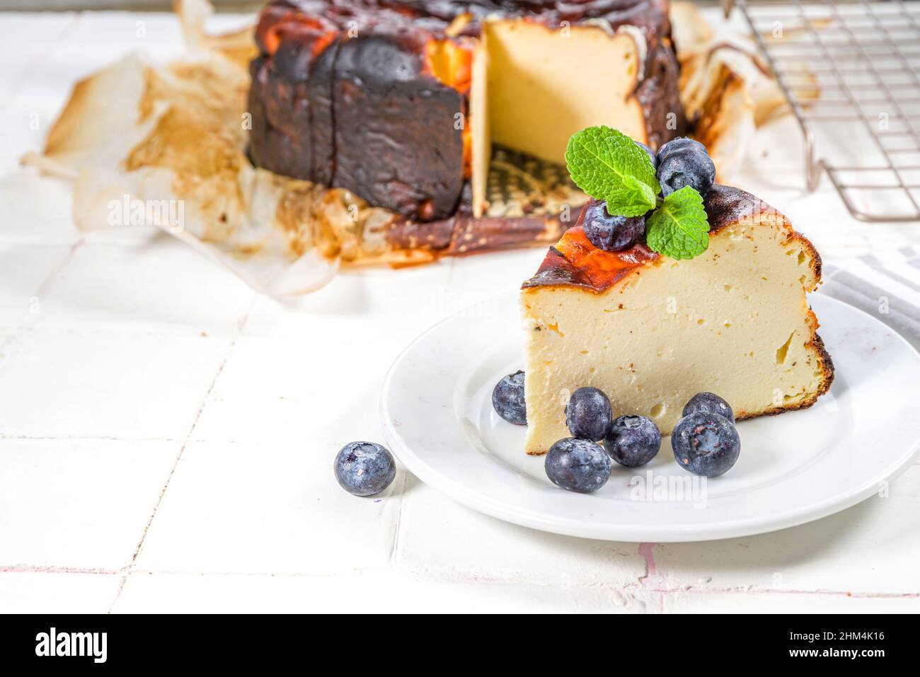 Homemade Burnt Basque Cheesecake, Piece of Basque burnt cheesecake with ...