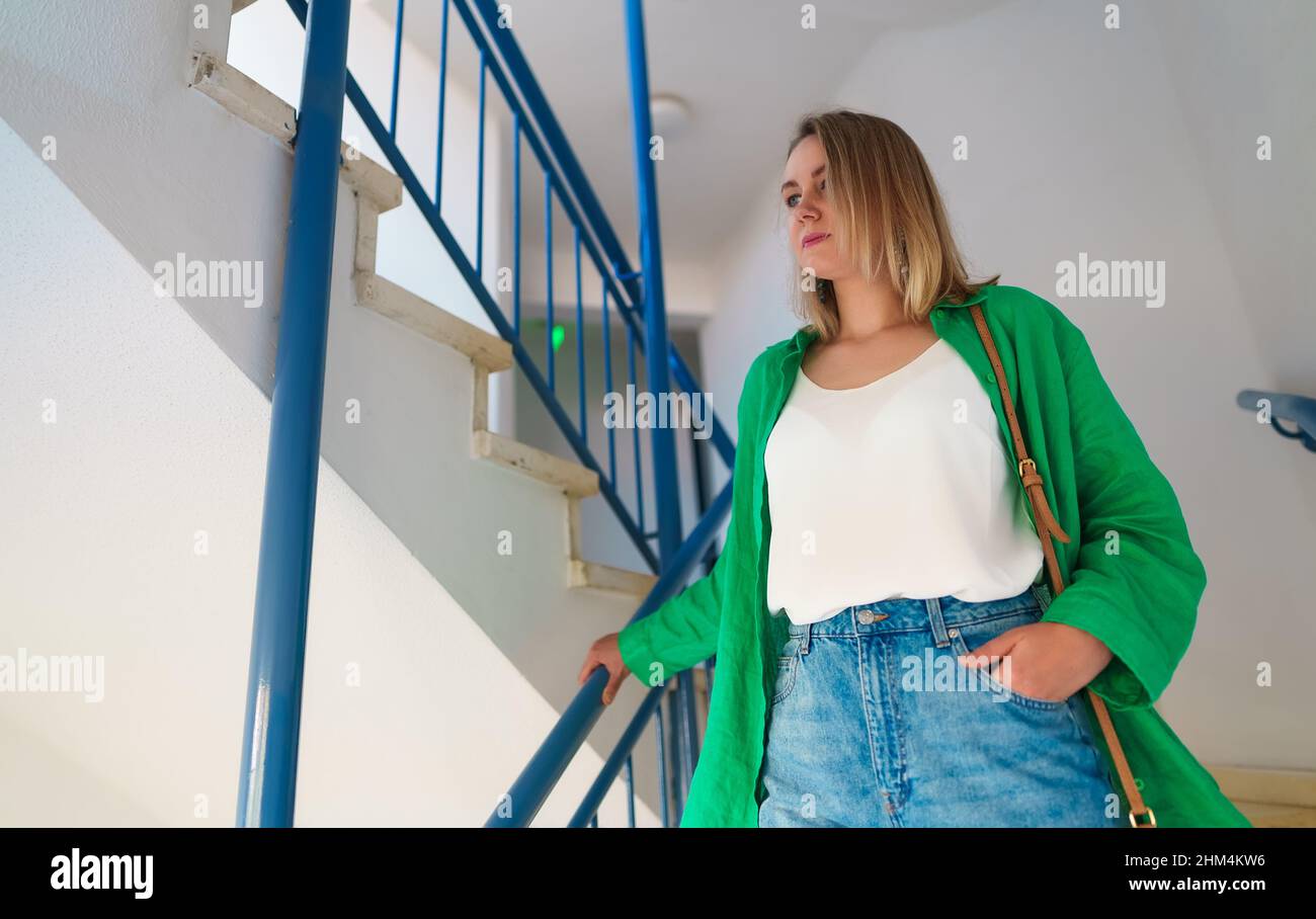 Girl going down stairs in her house hi-res stock photography and images ...
