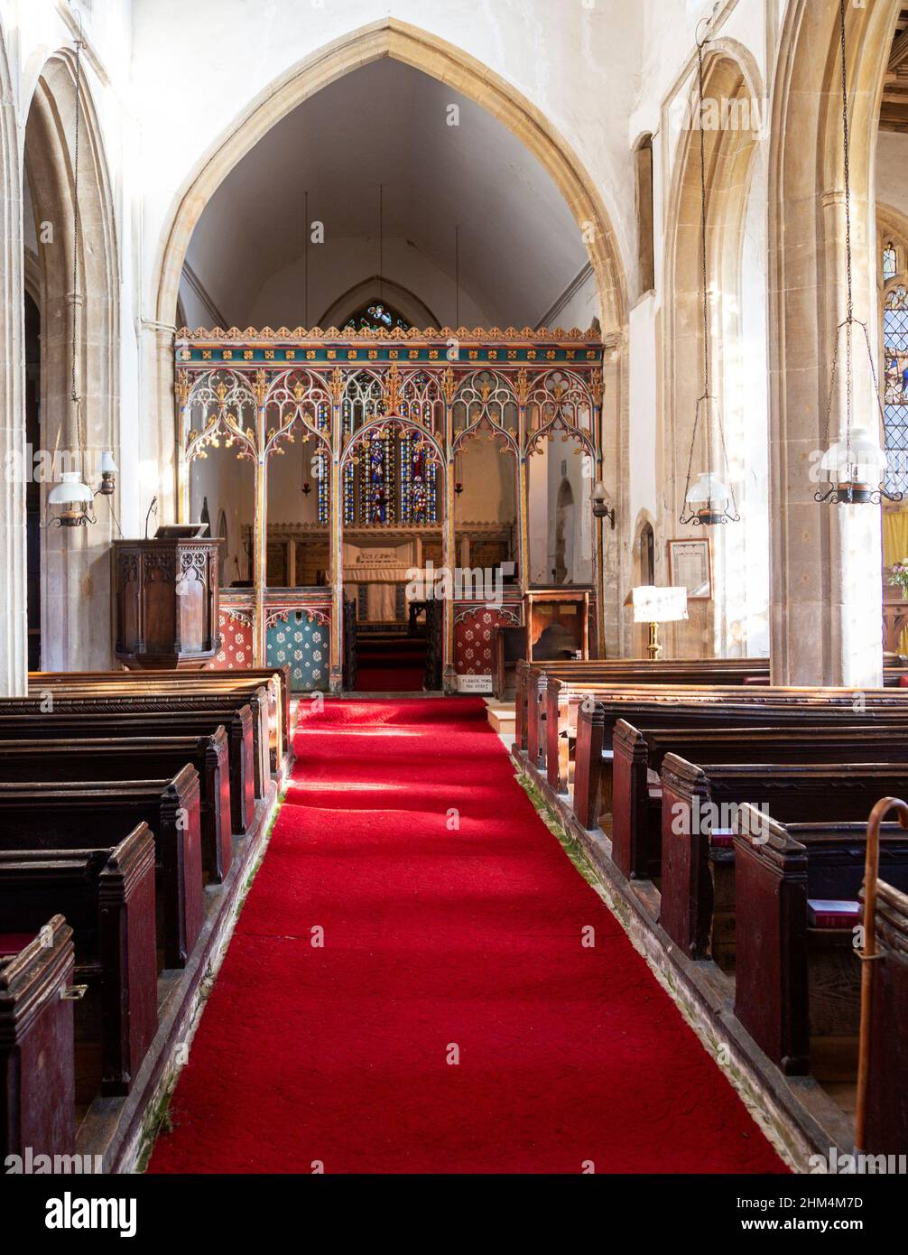 Fifteenth century rood screen, wooden pews in nave, Hessett church ...
