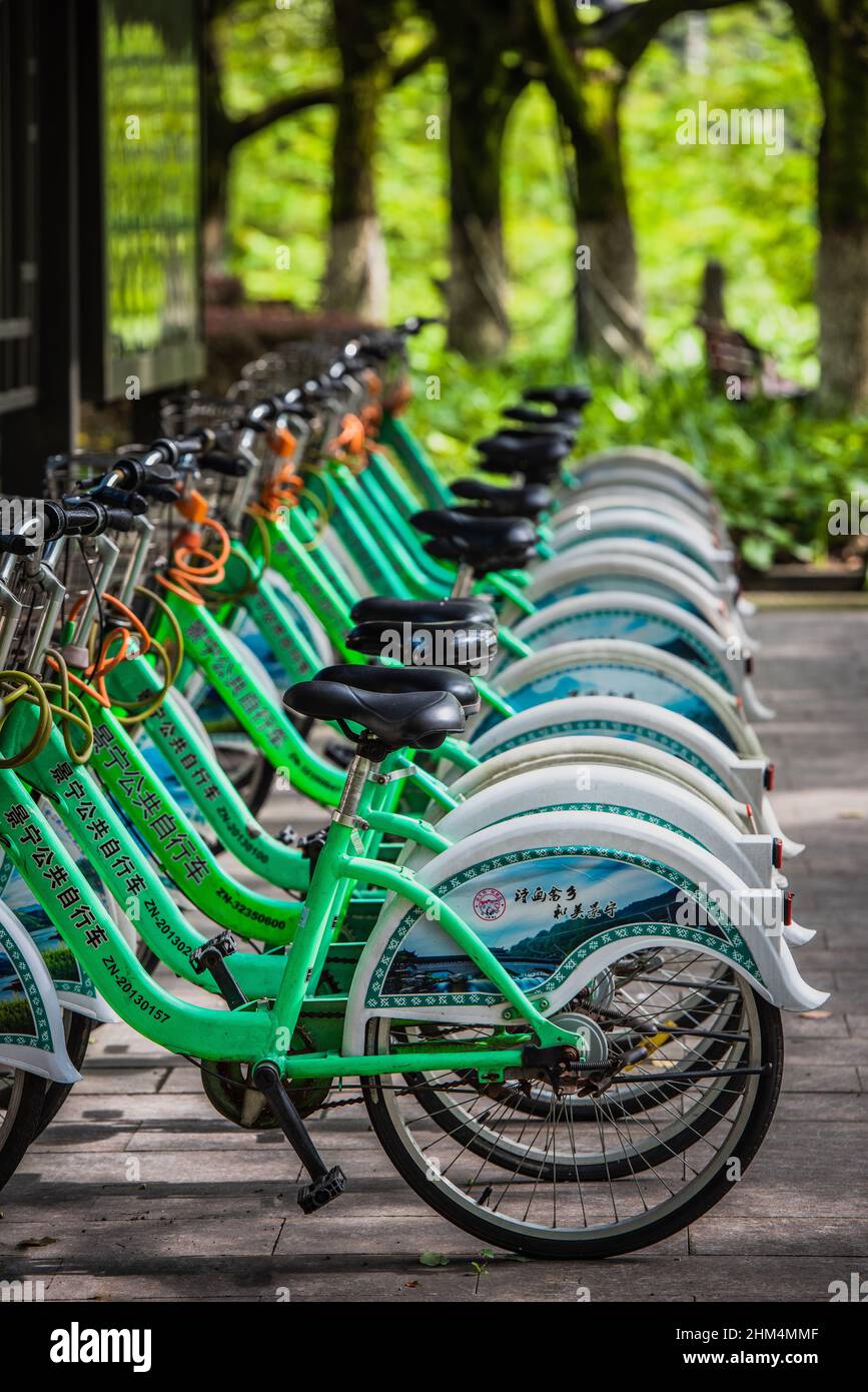 Sharing a bike pictures Stock Photo - Alamy