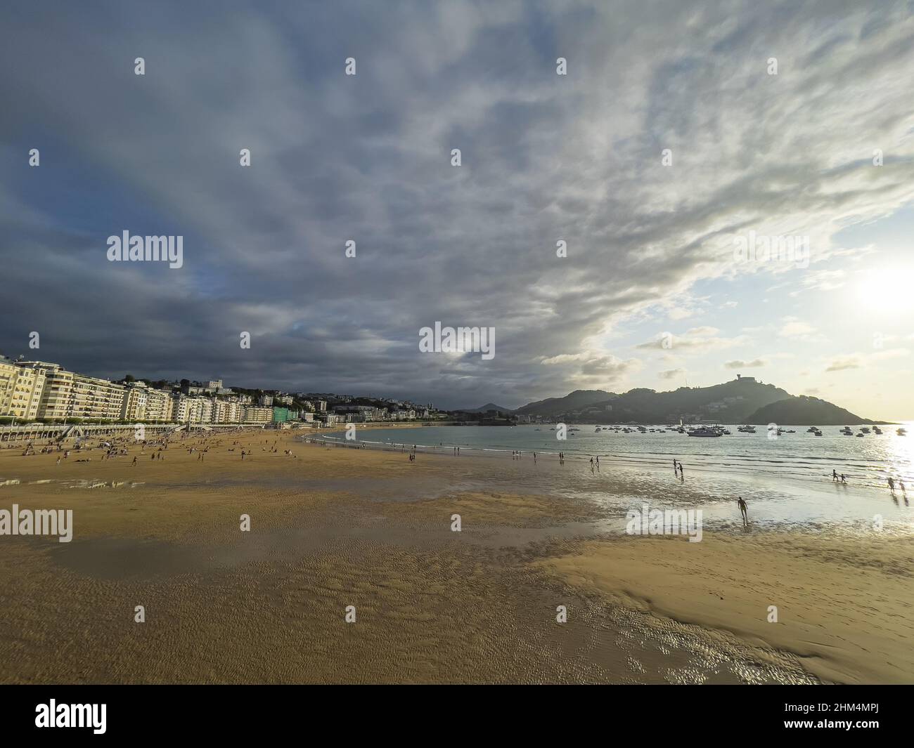 Playa de la Concha in San Sebastian, at low tide and people bathing ...