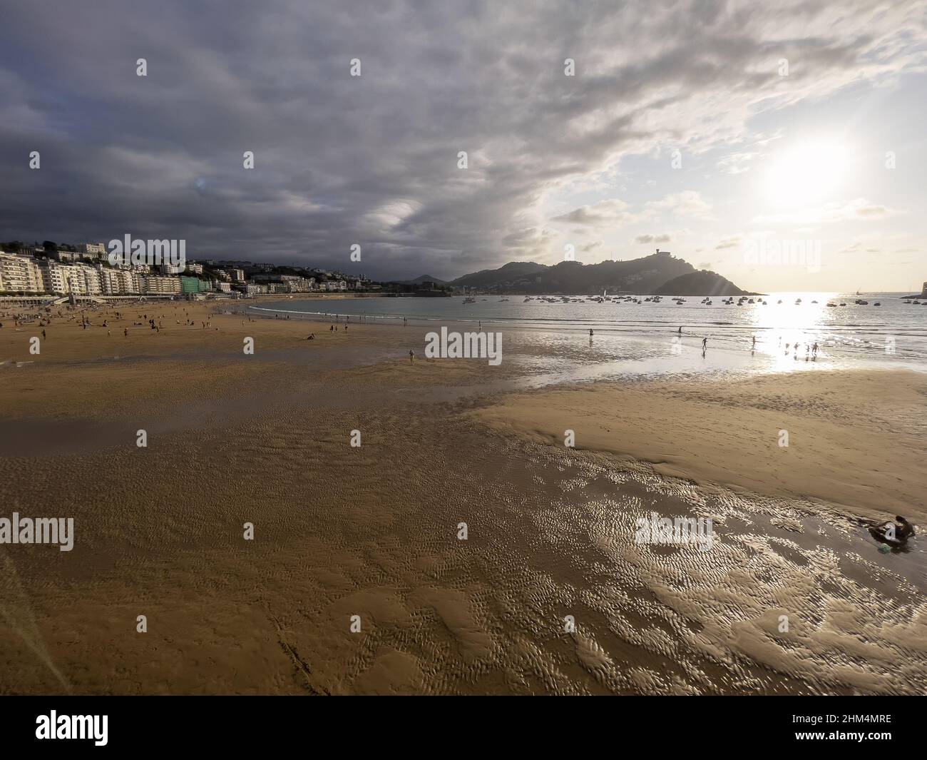 Playa de la Concha in San Sebastian, at low tide and people bathing ...