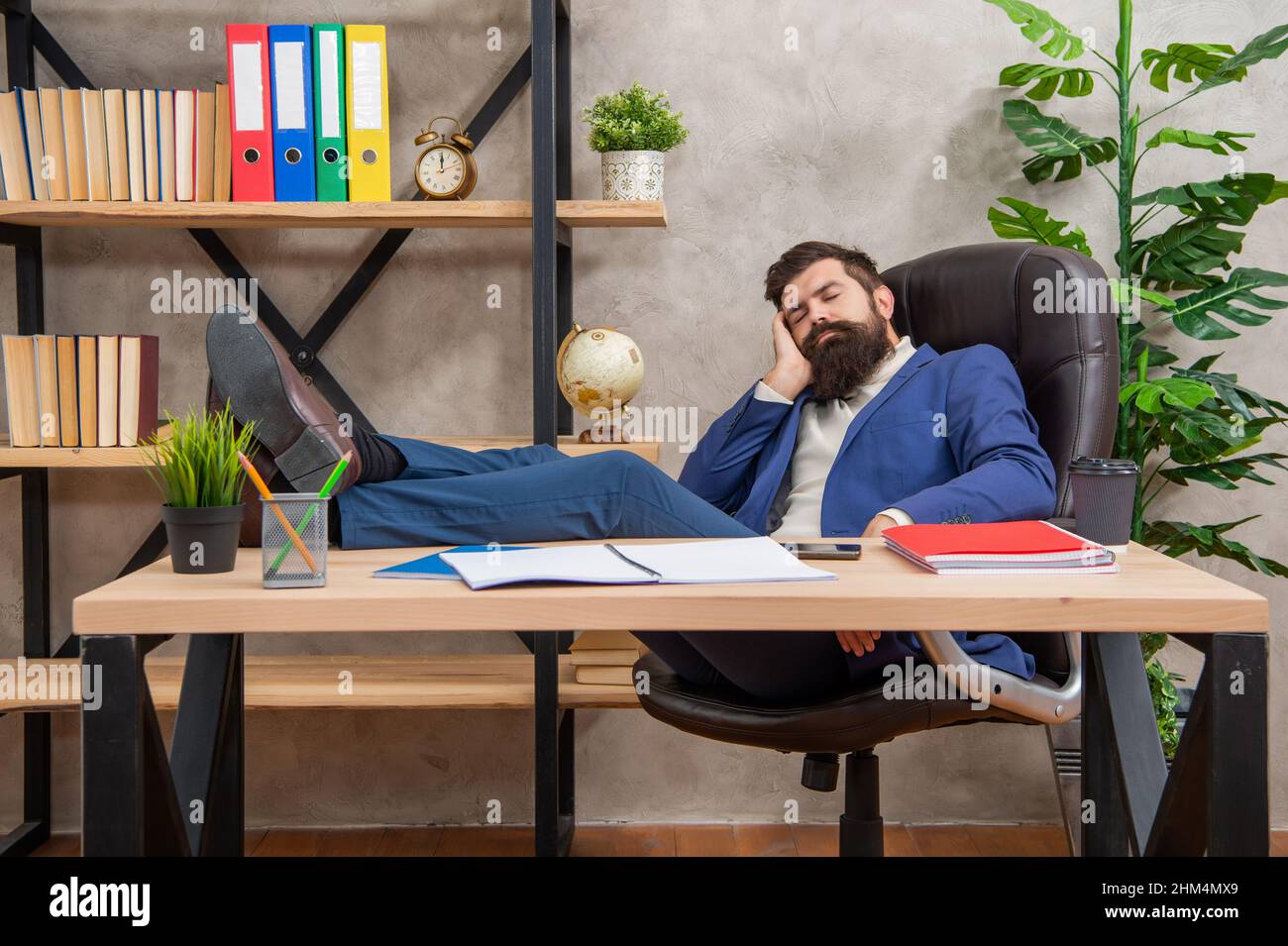 Tired manager napping with legs on desk during work rest in office, nap ...