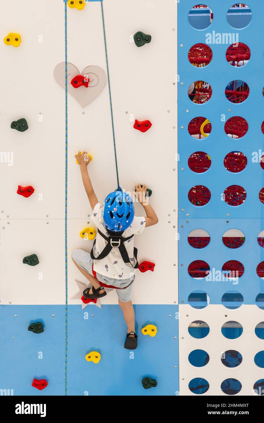 Childrens indoor rock climbing Stock Photo - Alamy