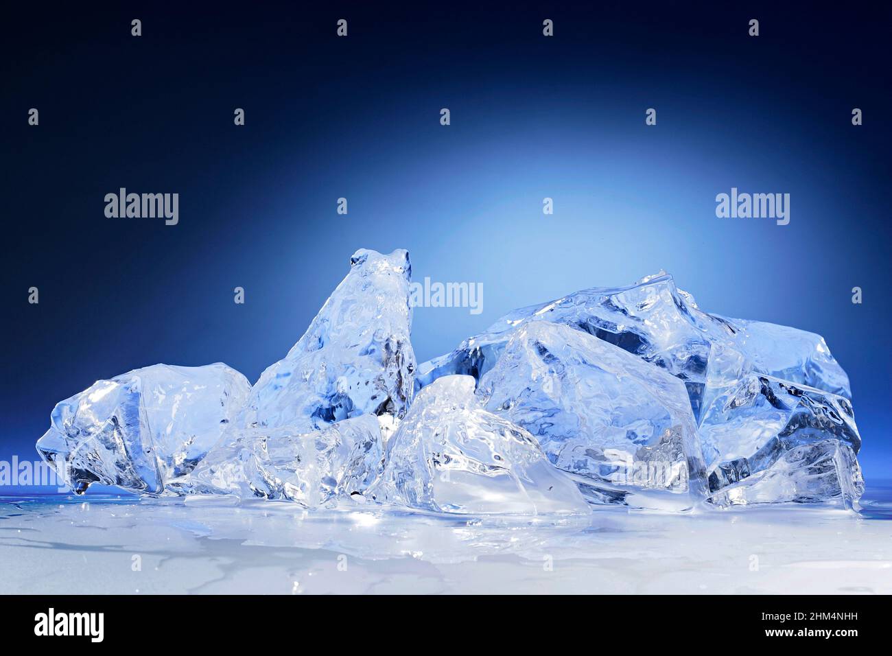ice blocks on blue background Stock Photo - Alamy