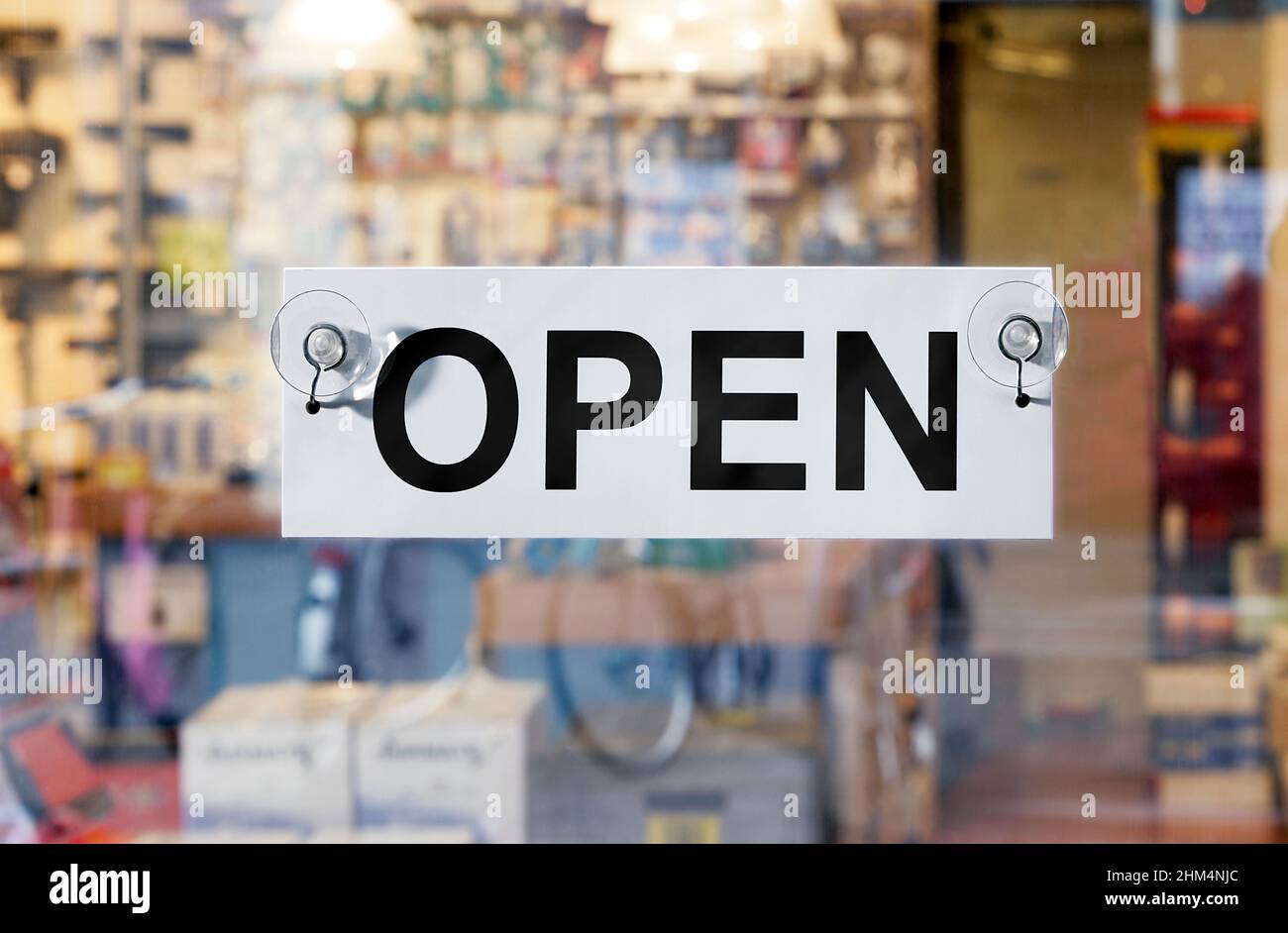 open sign on window with retail store Stock Photo - Alamy