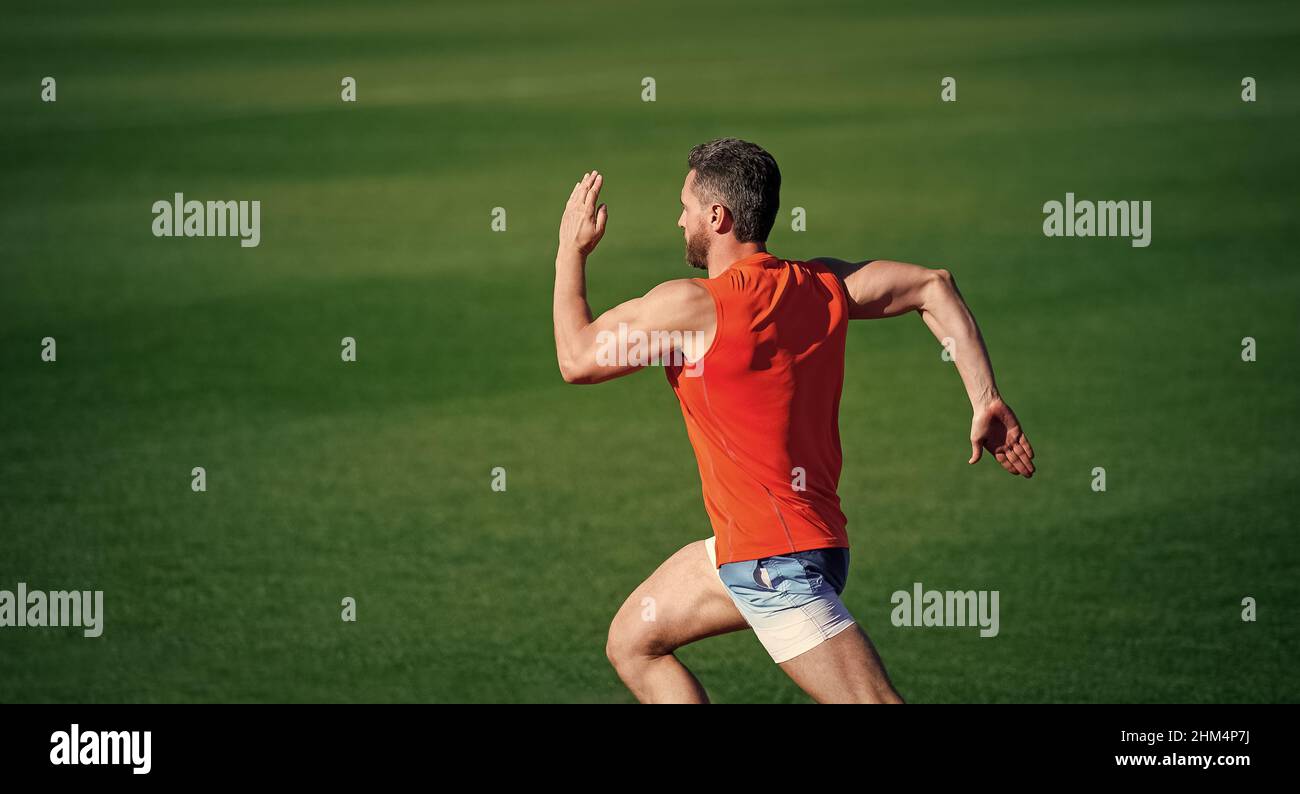 male sprinter running from start to finish with success and speed ...