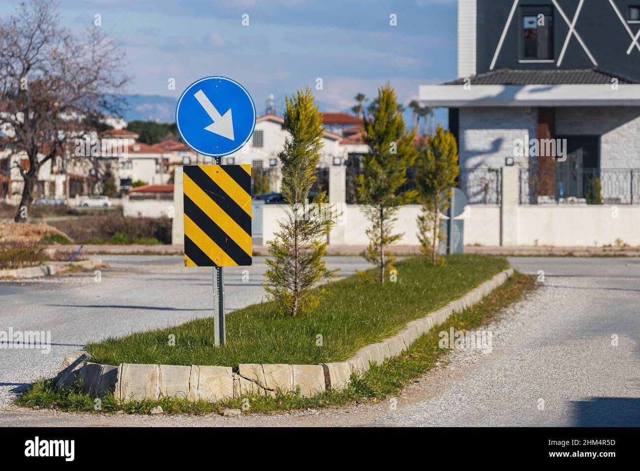 Close-up road sign detour on the right against the background of the ... Close-up road sign detour on the right against the background of the ...