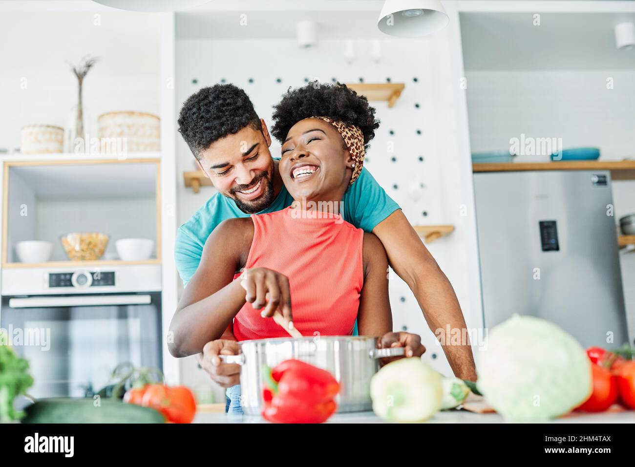 african american black couple kitchen home cooking love happy together ...
