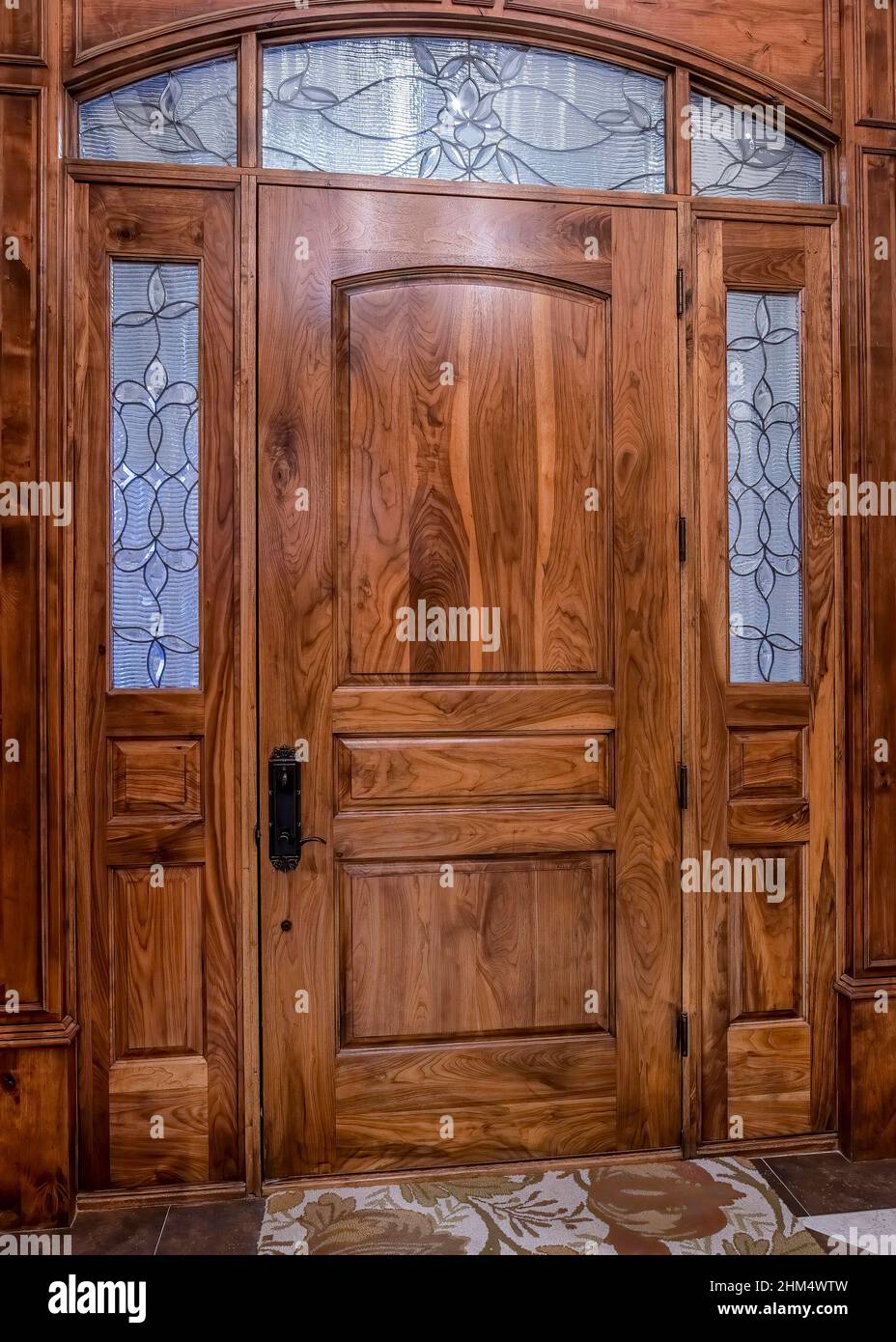 Vertical Front door interior of a house with craftsman design Stock ...