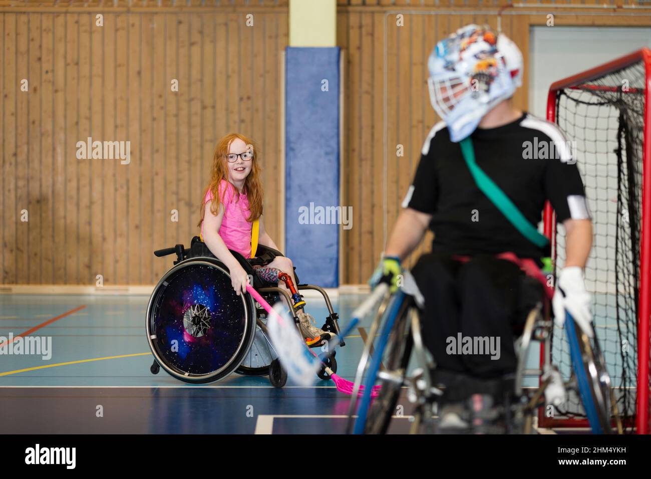 Disabled people playing in gym Stock Photo - Alamy
