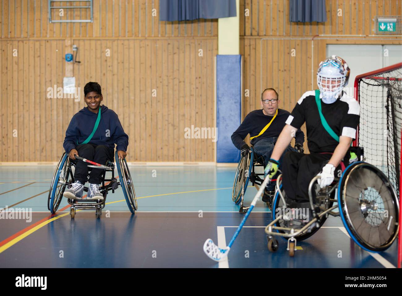 Disabled people playing in gym Stock Photo - Alamy