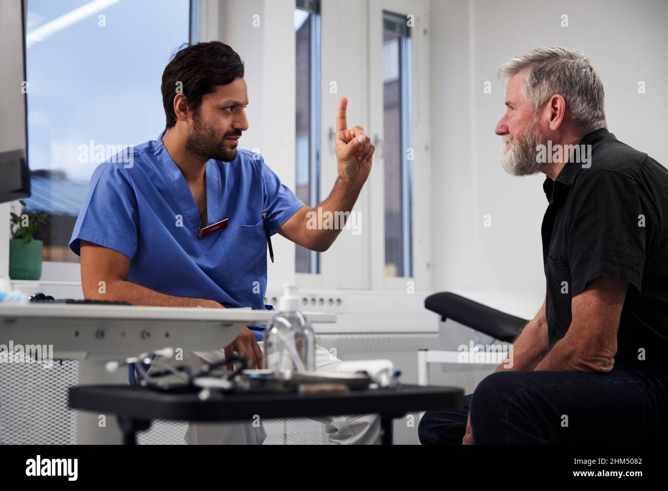 Vision examining hi-res stock photography and images - Alamy
