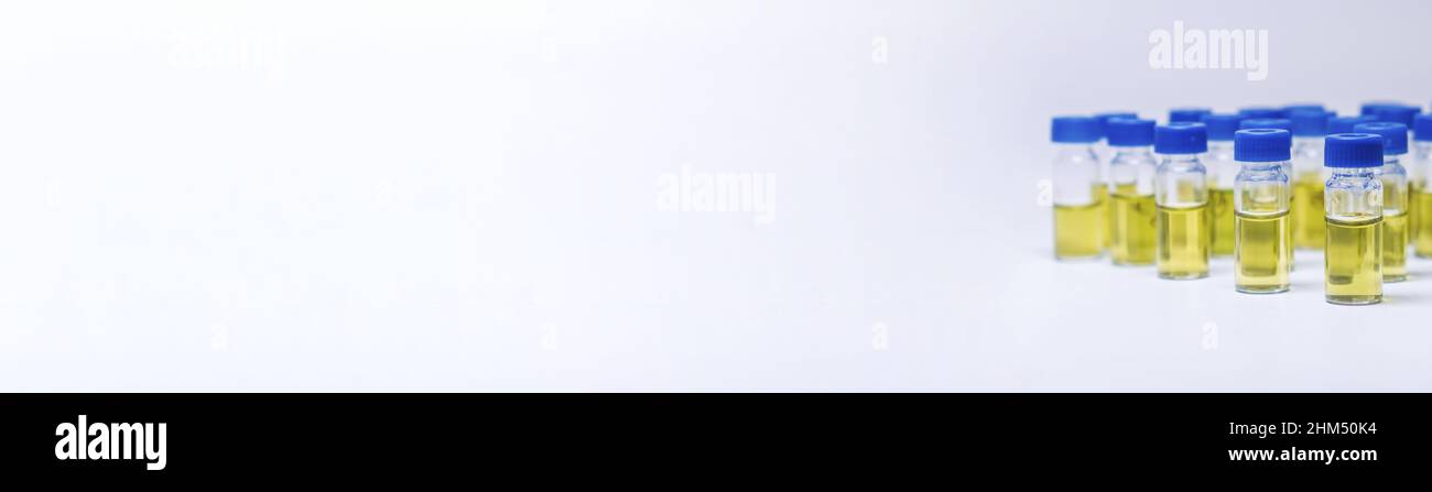 Banner with HPLC vials with urine sample for HPLC analysis in the ...