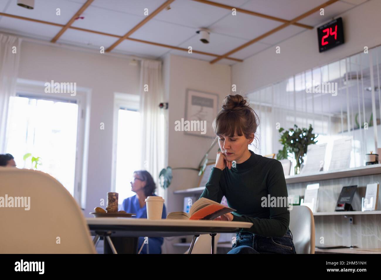 Two women in waiting room hi-res stock photography and images - Alamy