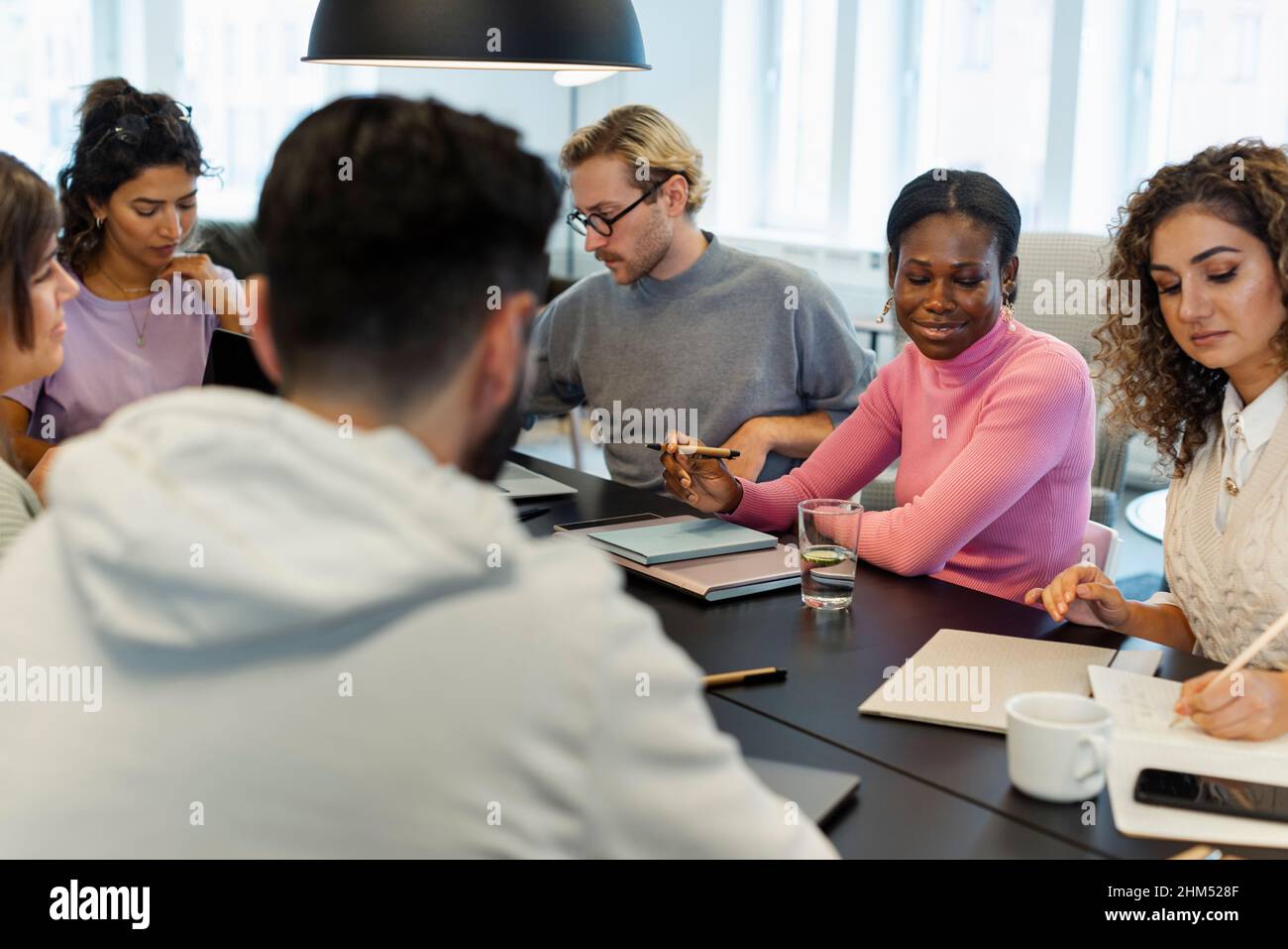 Business people having meeting in conference room Stock Photo - Alamy