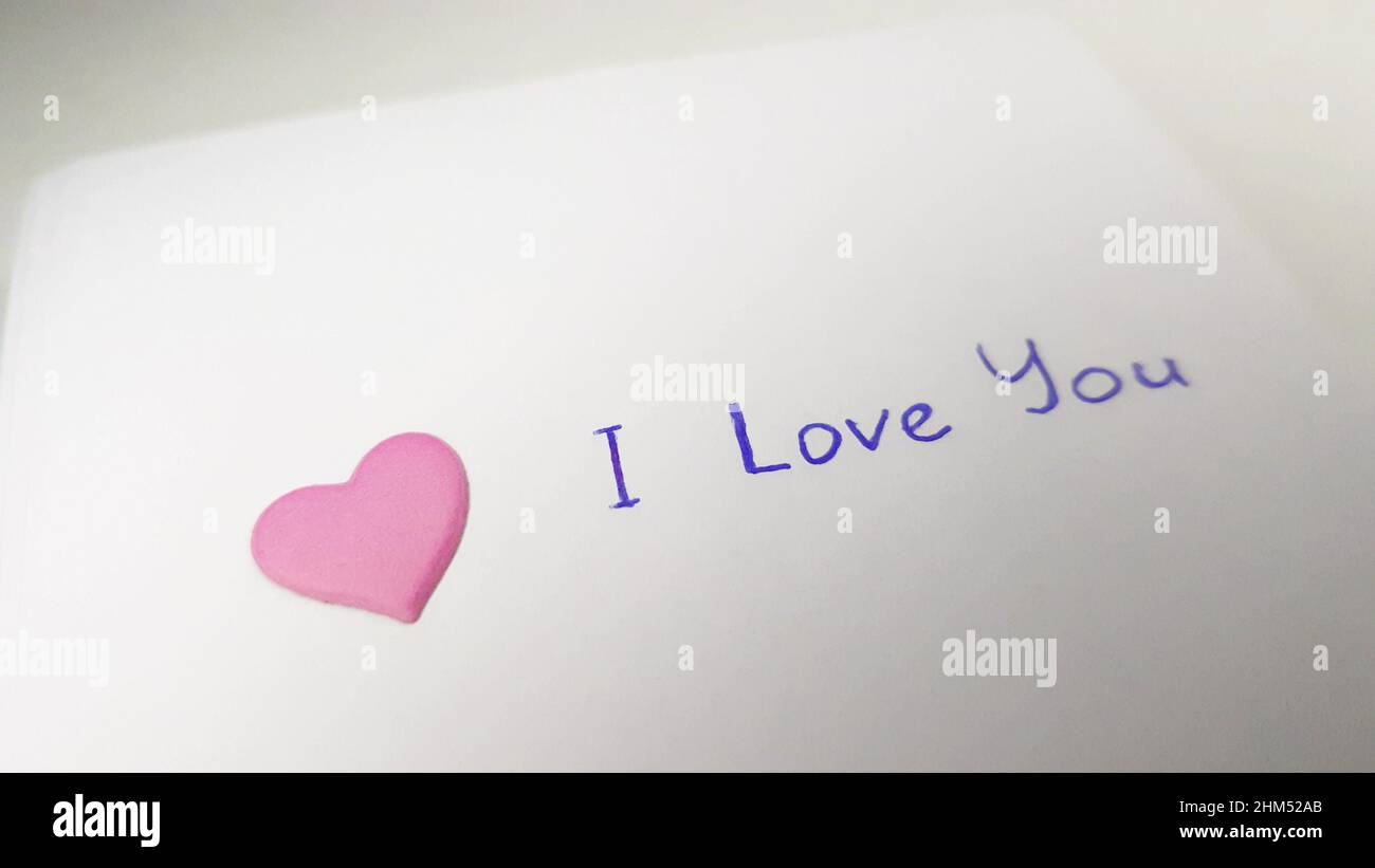 Love you text with heart hi-res stock photography and images - Alamy