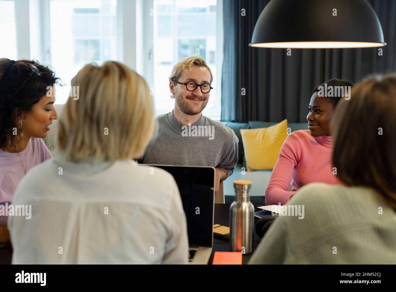 Five young people having meeting hi-res stock photography and images ...