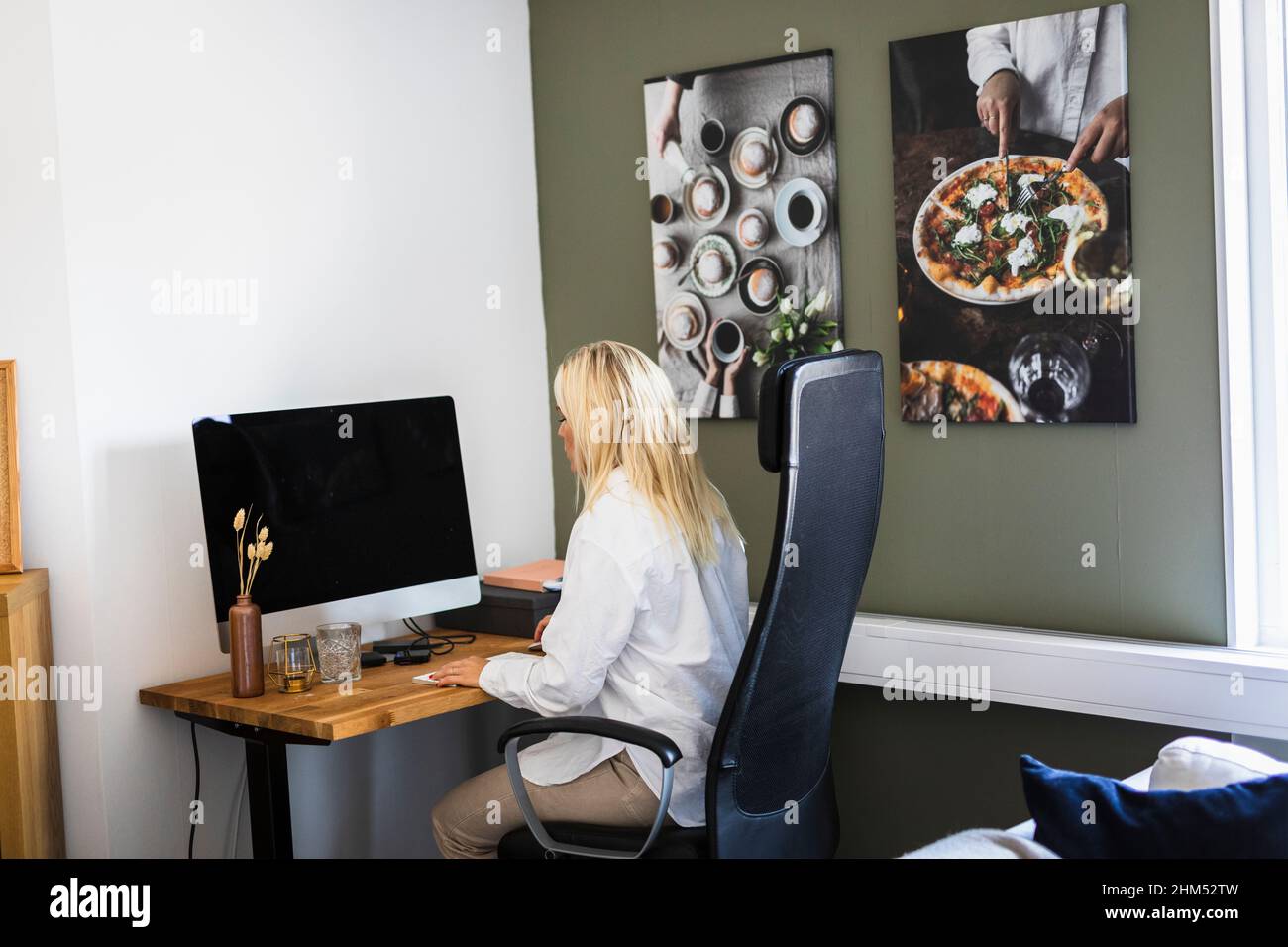Woman using PC computer Stock Photo - Alamy