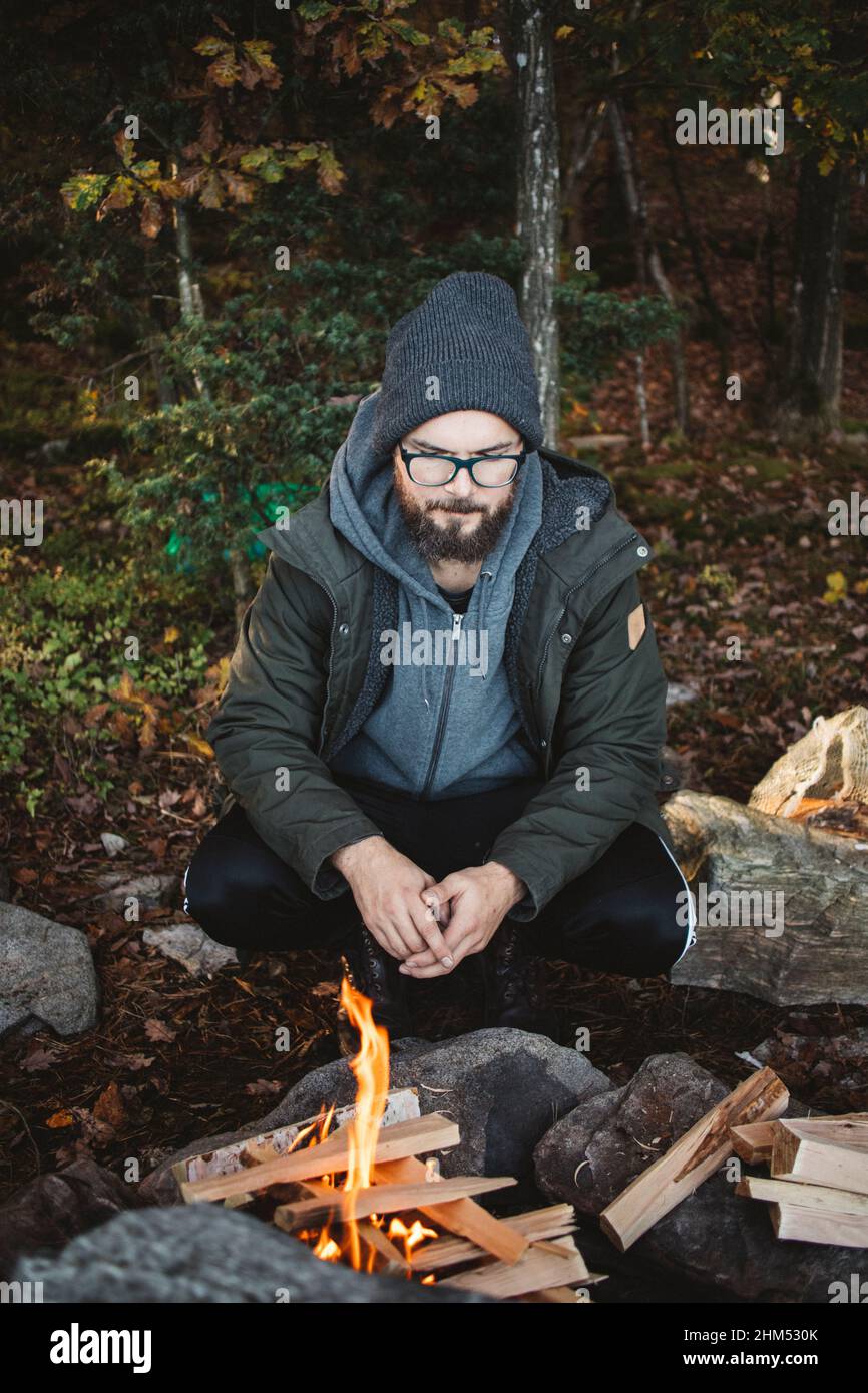 Smoking man in the forest hi-res stock photography and images - Alamy