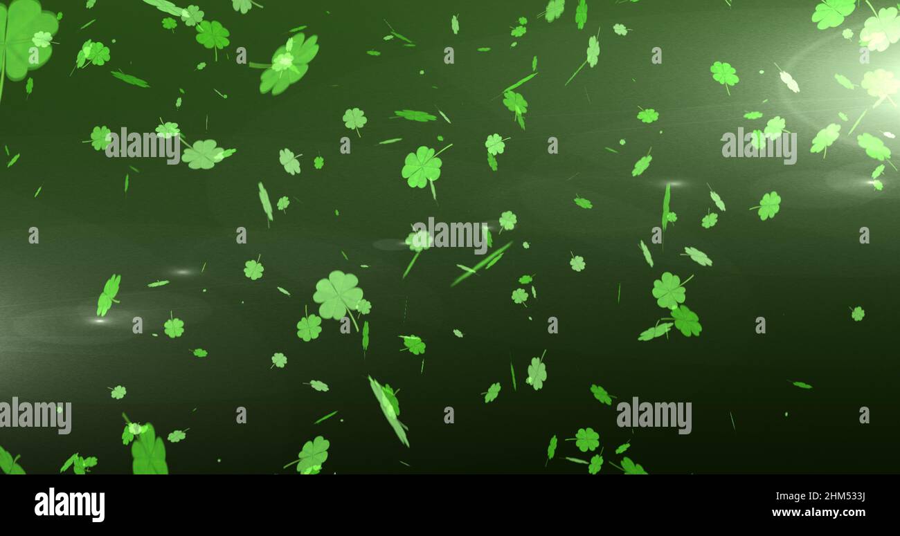 Image of St Patricks Day multiple shimmering floating green shamrocks ...