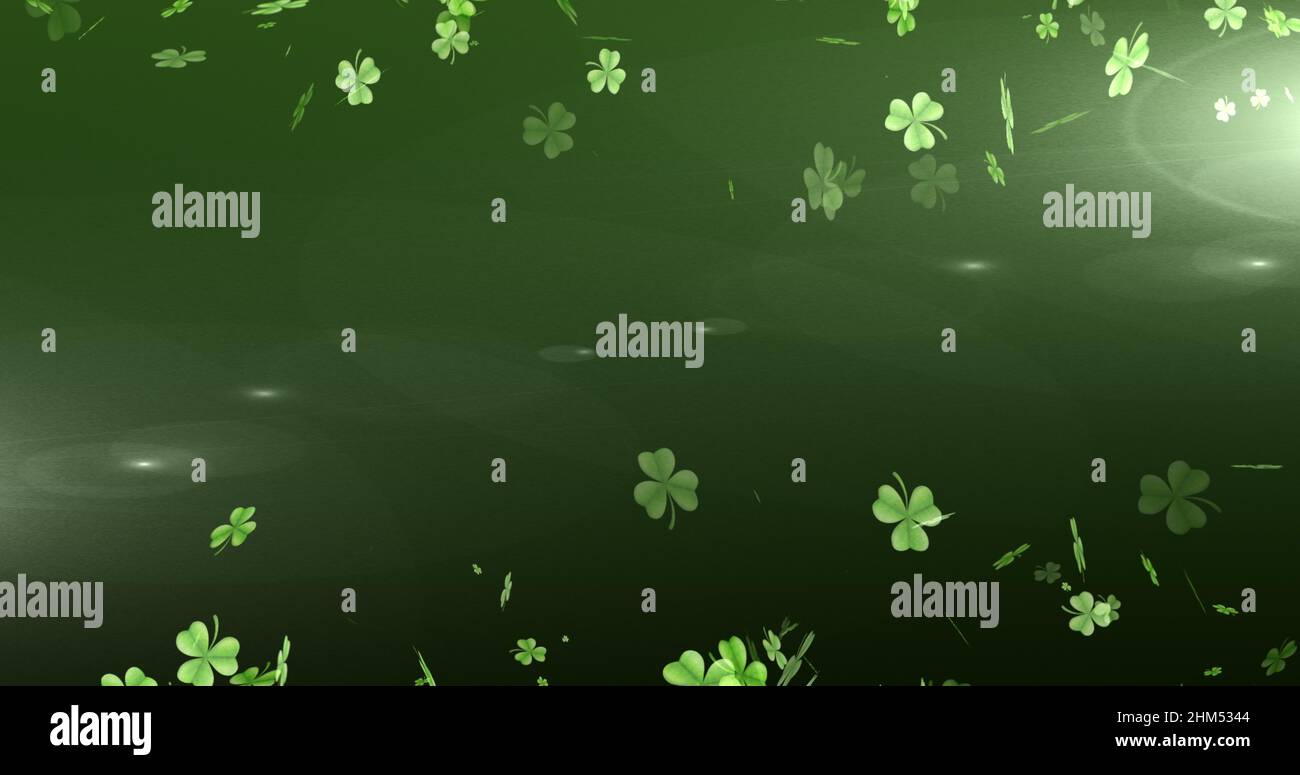 Image of st patricks day multiple shimmering floating green shamrocks ...