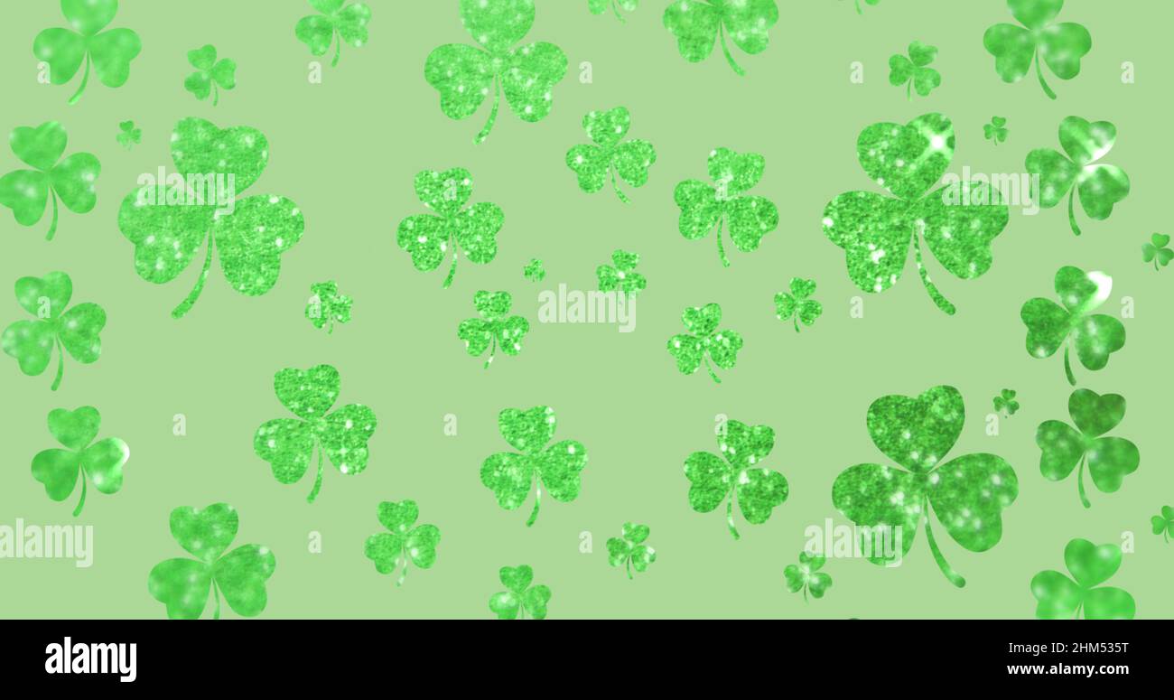 Image of st patricks day multiple shimmering green shamrocks falling ...