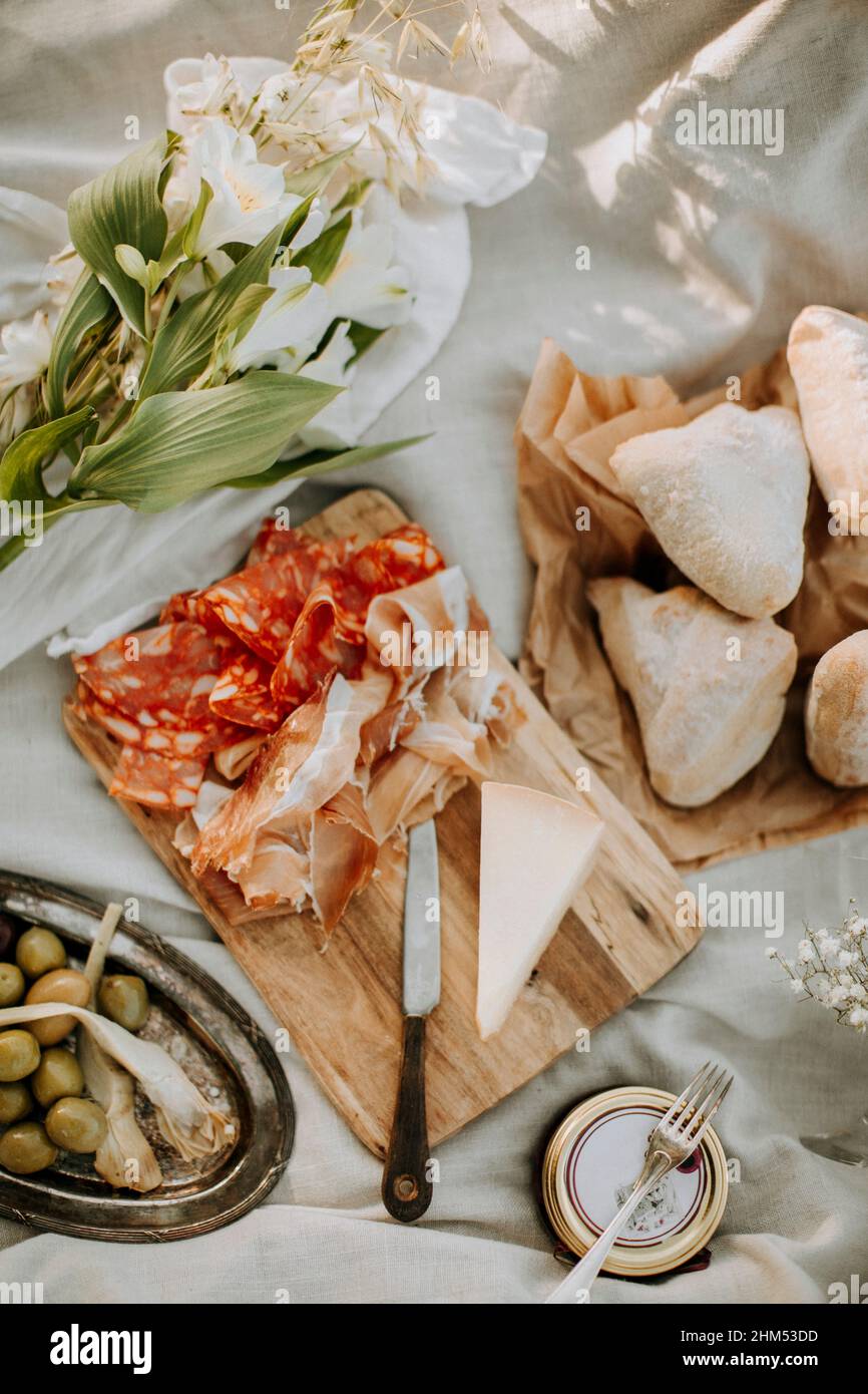 Ham and cheese board on table Stock Photo - Alamy