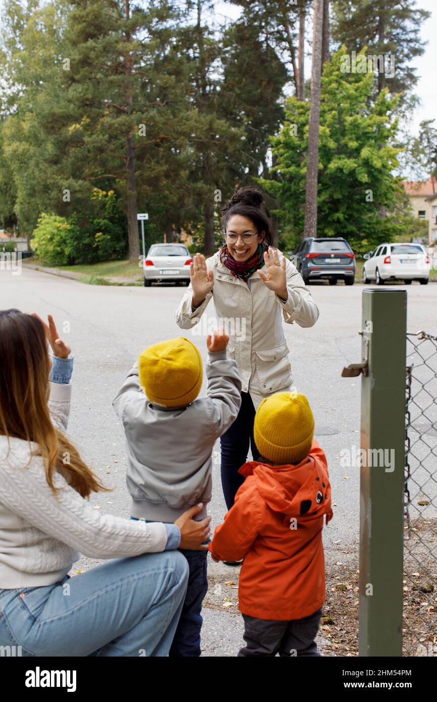 Children greeting hi-res stock photography and images - Alamy