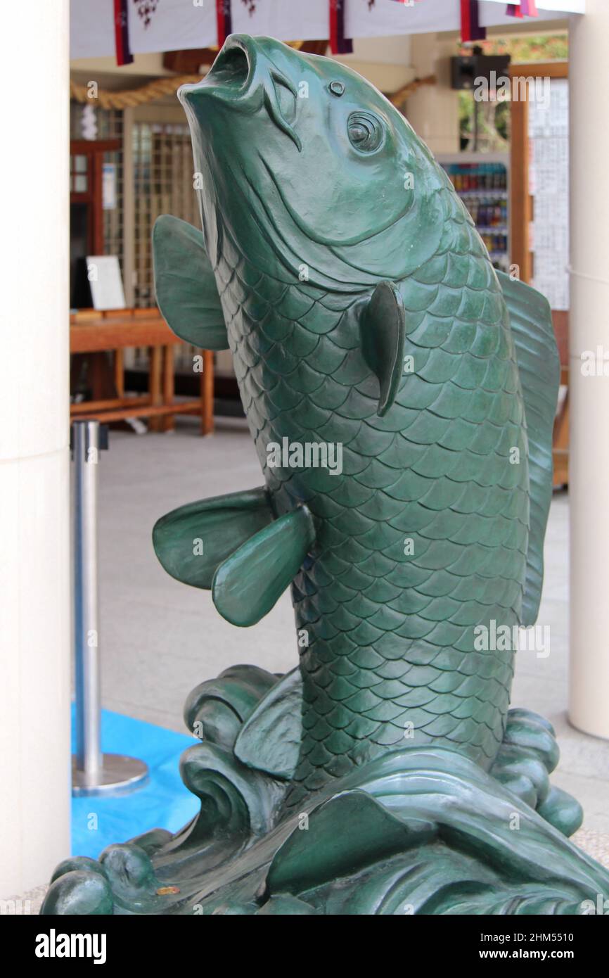 statue of a fish (carp ?) in a shinto temple (gokoku-jinja) in ...