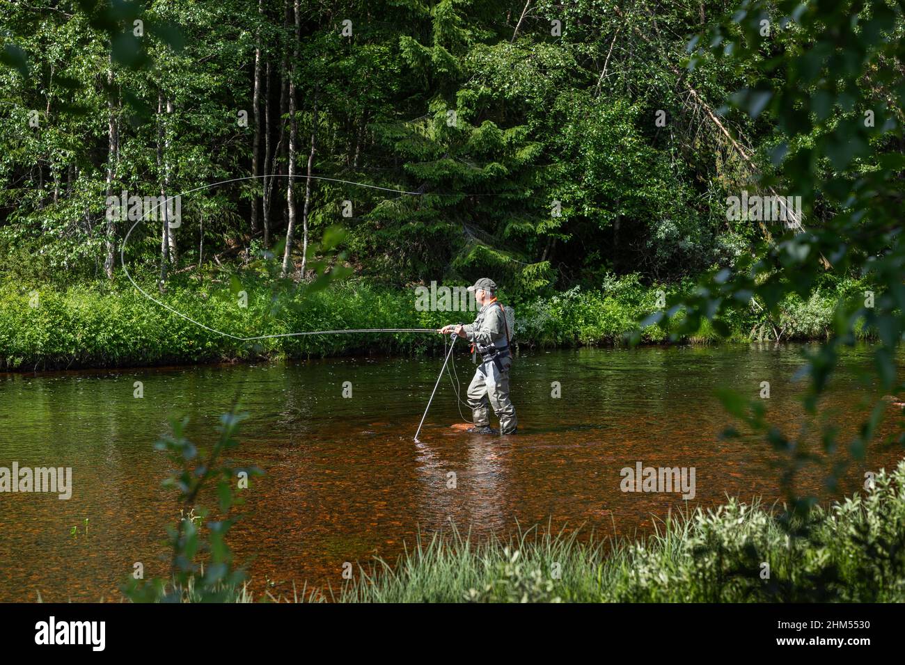 Old man fly fishing hi-res stock photography and images - Alamy