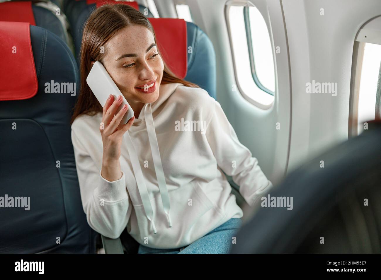 Woman talking plane hi-res stock photography and images - Alamy