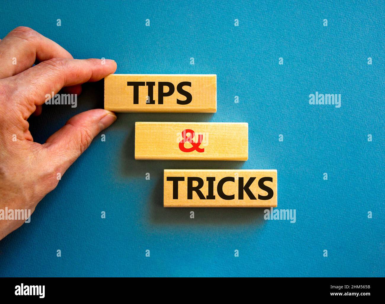 Tips and tricks symbol. Concept words Tips and tricks on wooden blocks ...