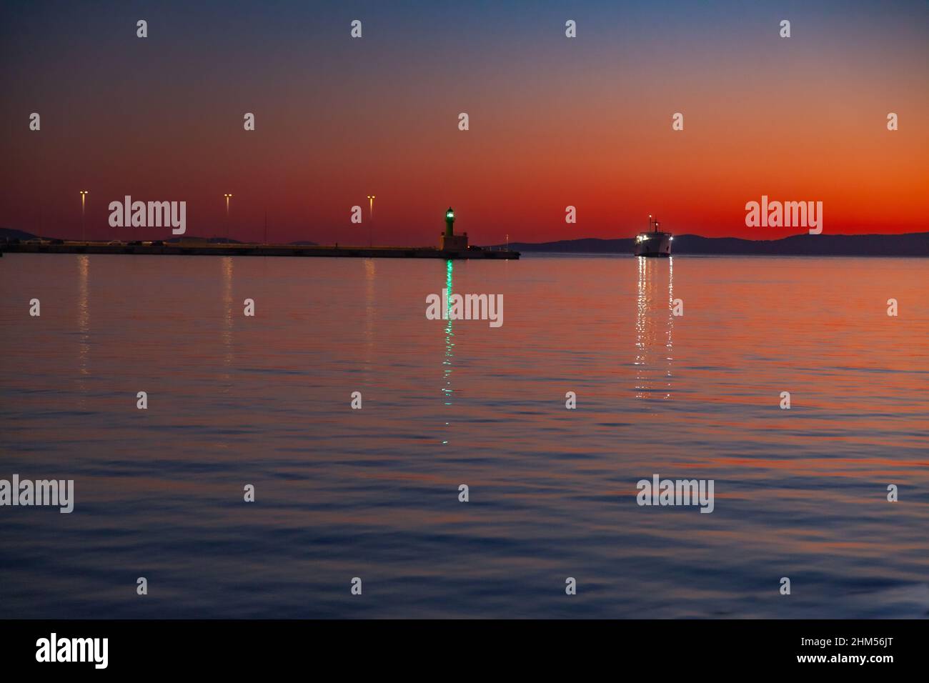Split waterfront harbor at night Stock Photo - Alamy