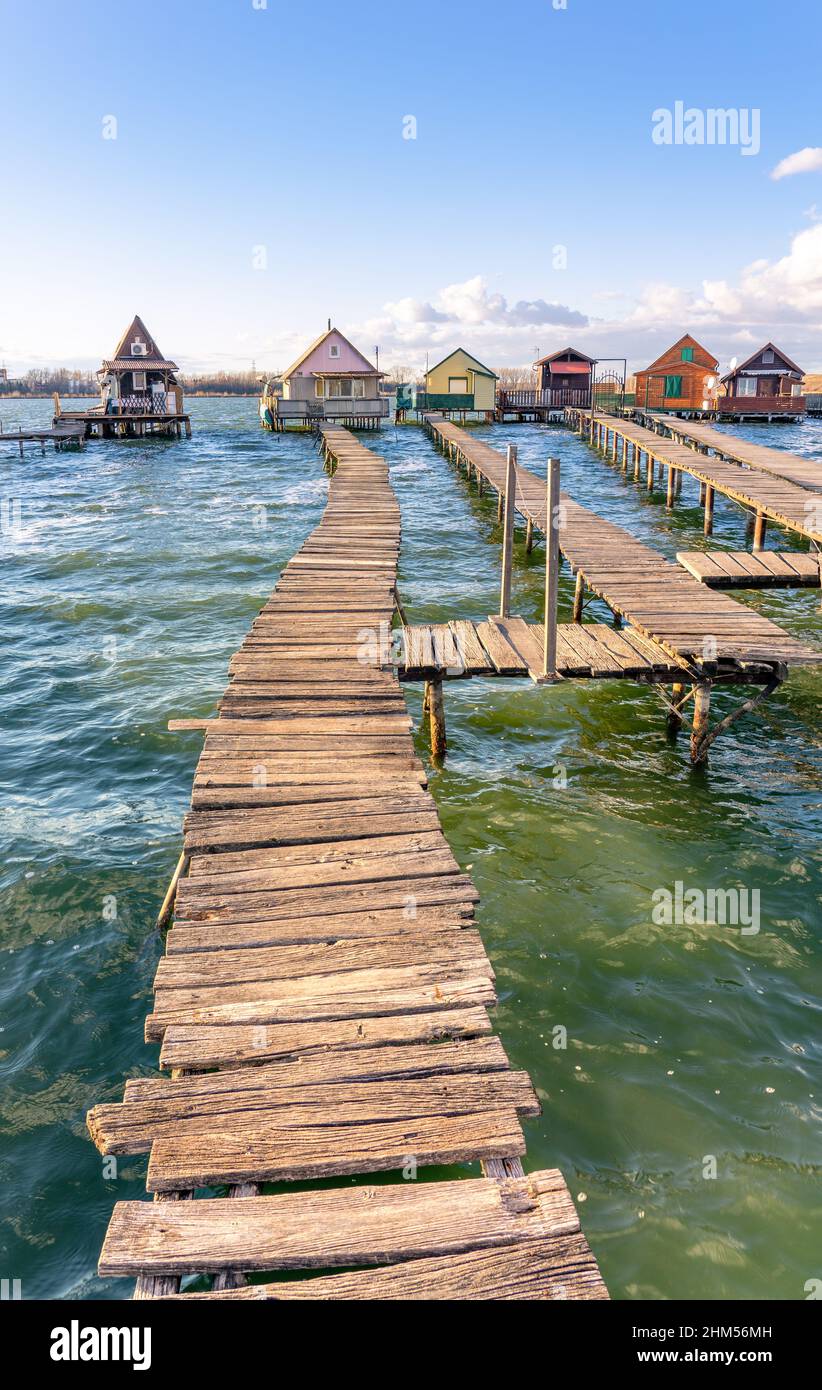 floating village bungalows in Bokod Hungary wit wooden pier Stock Photo ...