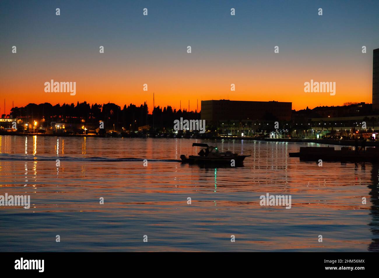 Split waterfront harbor at night Stock Photo - Alamy