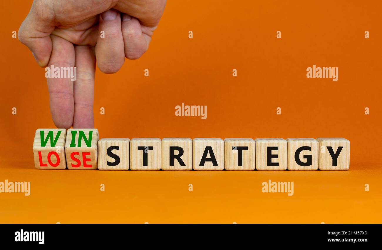 Win-lose strategy symbol. Businessman turns wooden cubes and changes ...