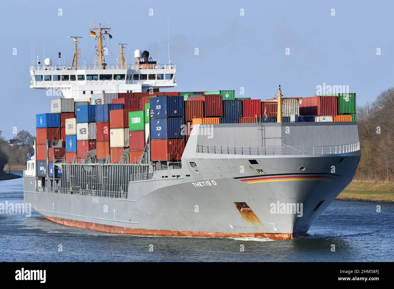 Containership THETIS D passing the Kiel Canal Stock Photo - Alamy