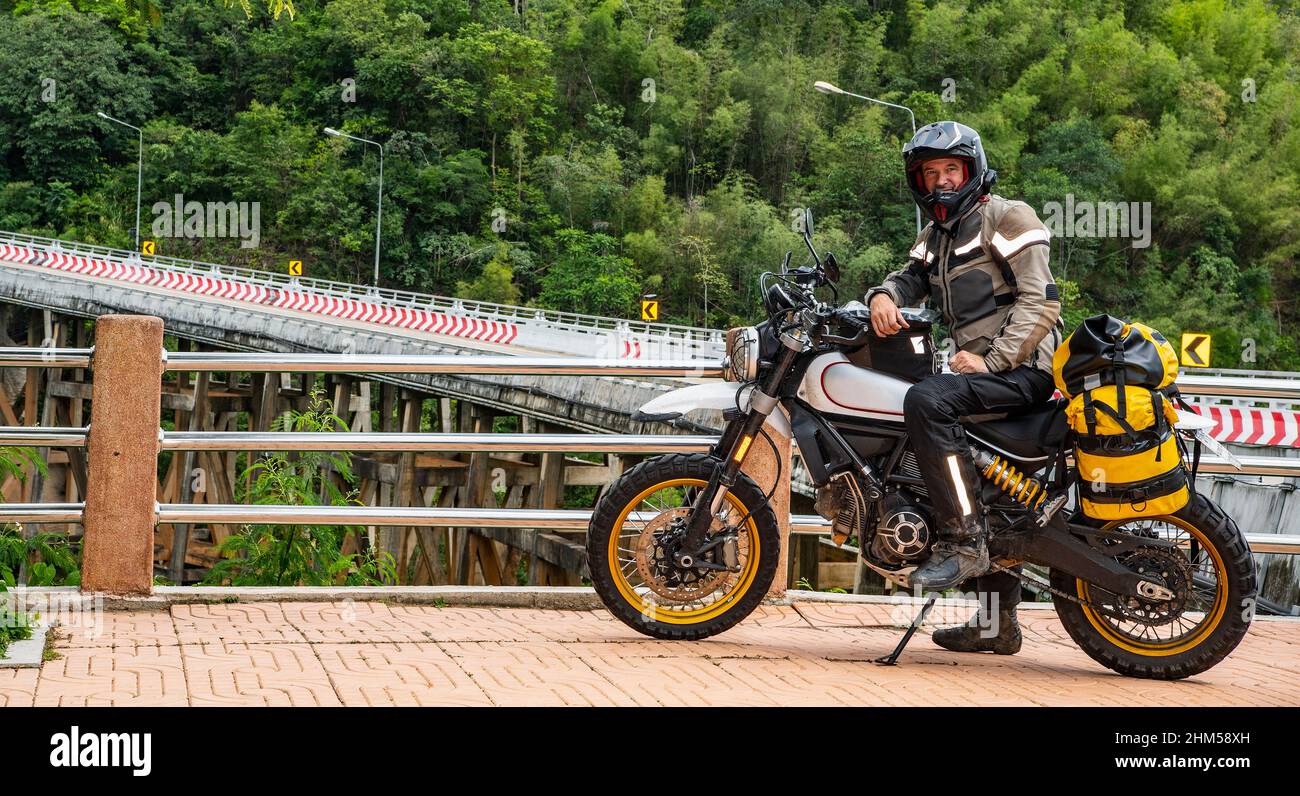 Man posing on motorcycle hi-res stock photography and images - Alamy