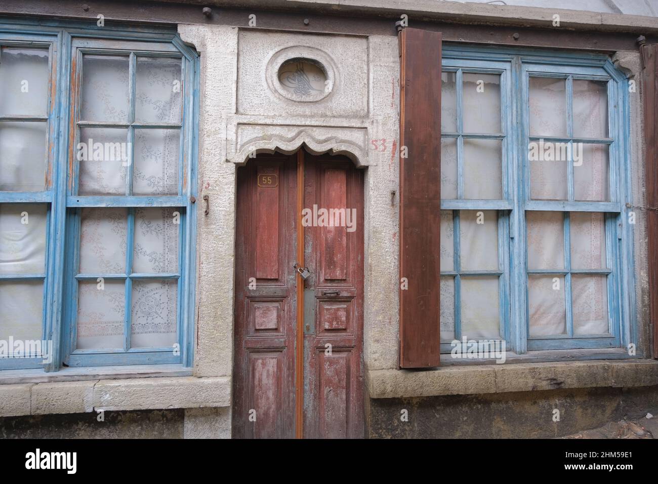 Vintage style door and window, Ottoman sultan's signature on top of ...